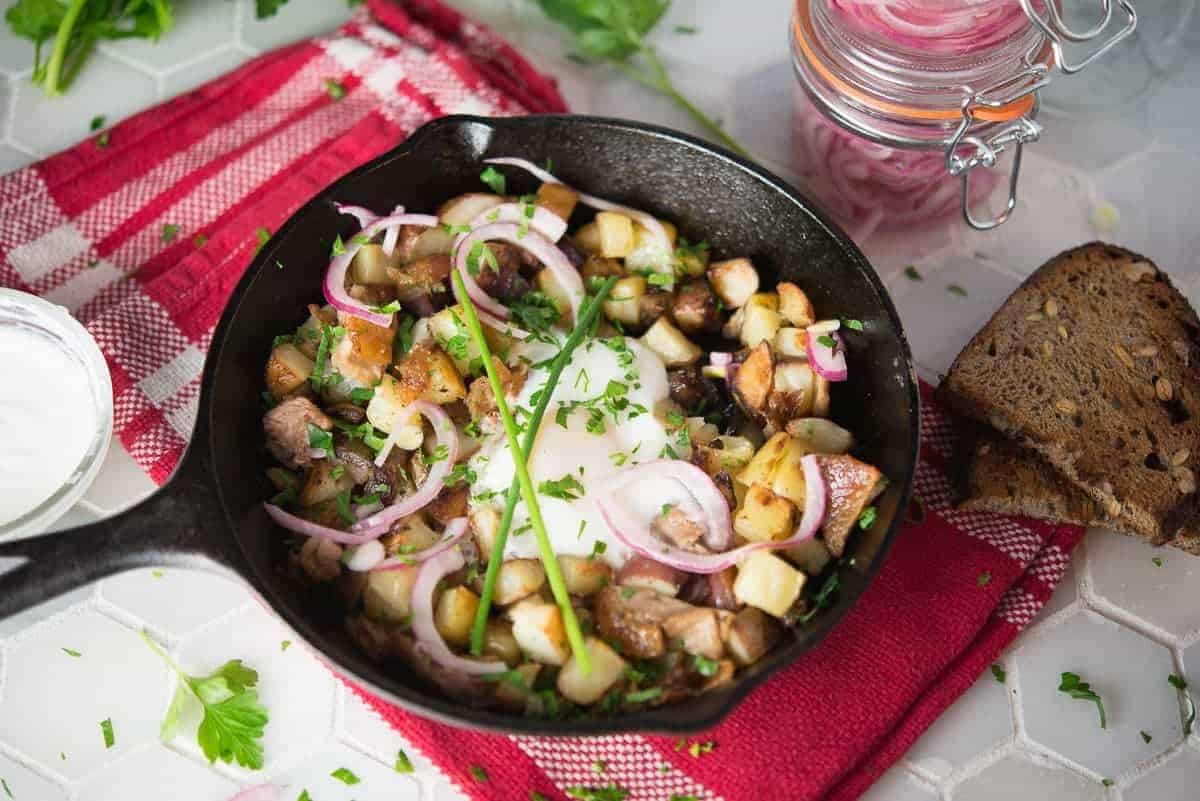 Duck Hash with Poached Eggs and Pickled Red Onions - Foodology Geek